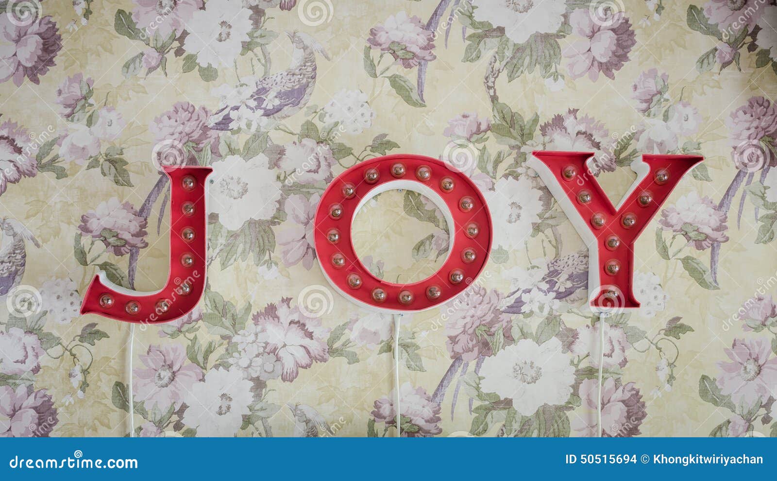 Word Joy hang on wallpaper stock photo. Image of symbol - 50515694