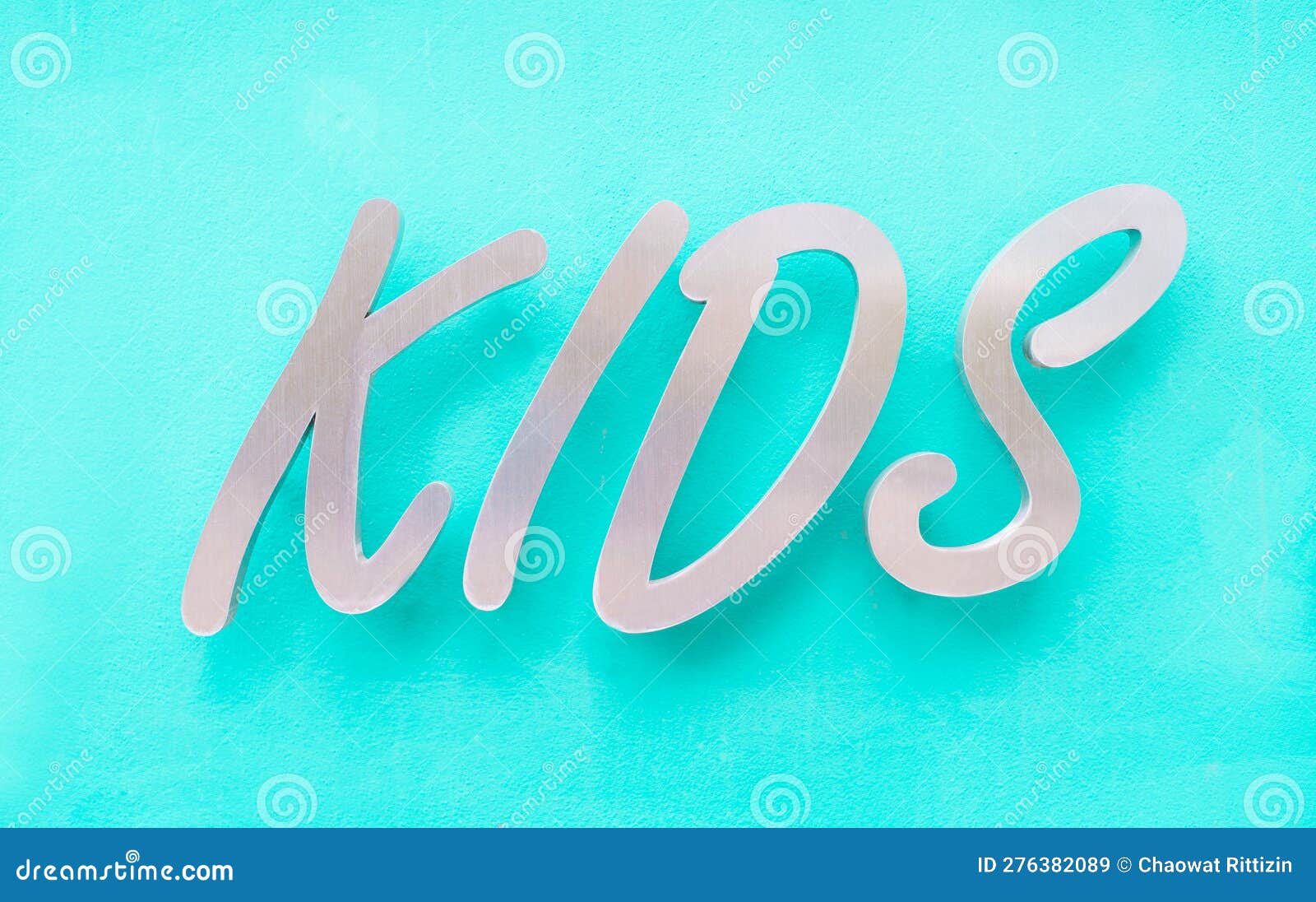 Word Kids Made of Steel on Blue Wall Stock Image - Image of white, font ...
