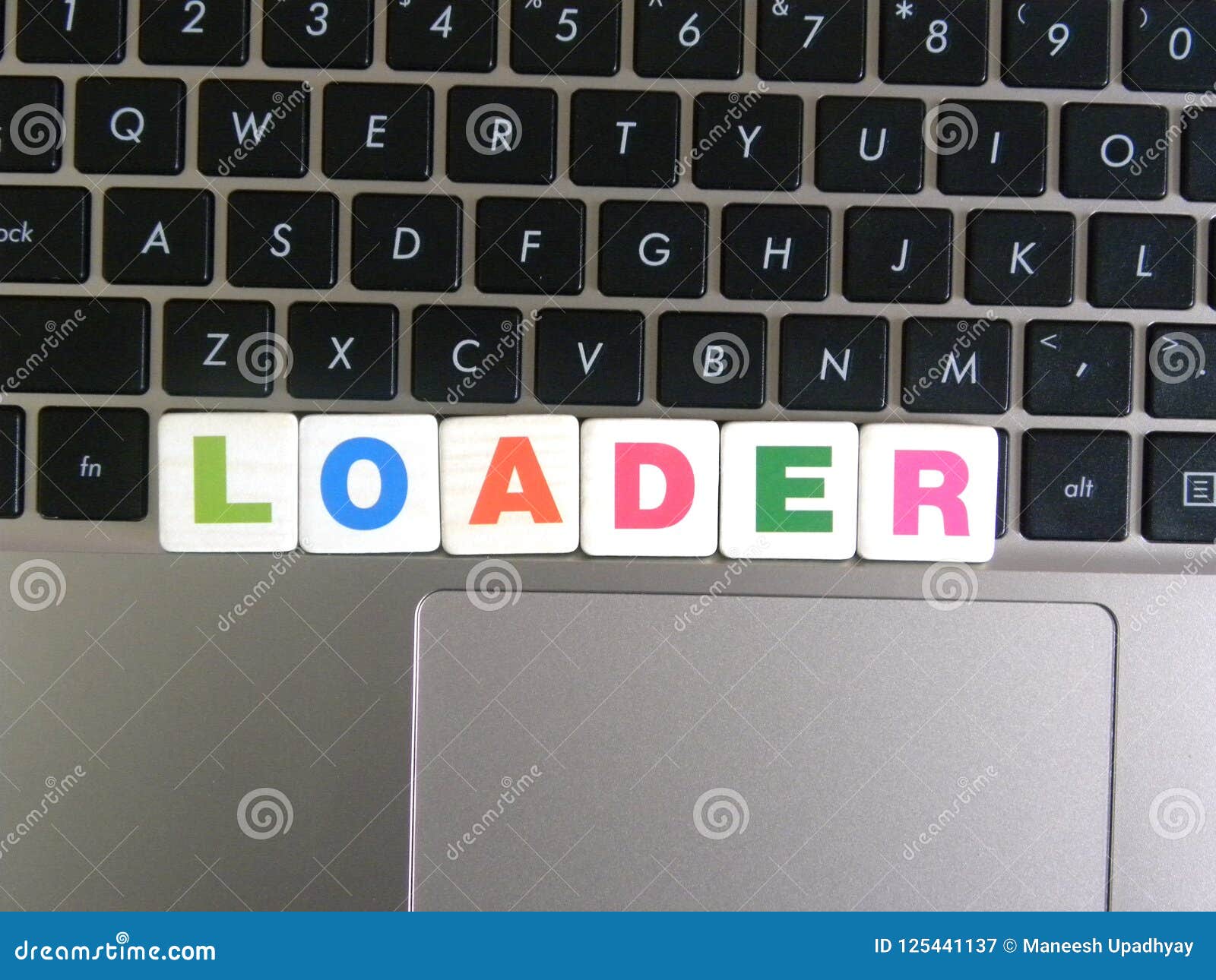 Word Loader on Keyboard Background Stock Image - Image of development ...
