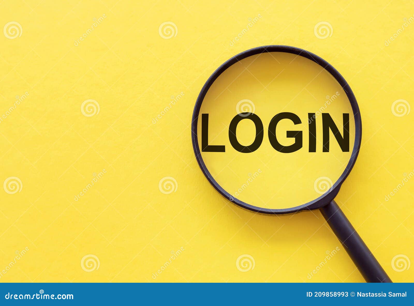 The Word LOGIN is Written on a Magnifying Glass on a Yellow Background ... The Word LOGIN is Written on a Magnifying Glass on a Yellow Background ...