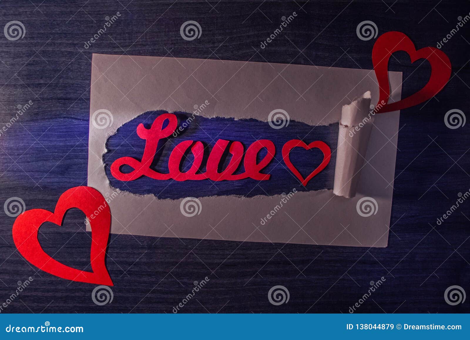 Word love in torn paper stock image. Image of valentines - 138044879
