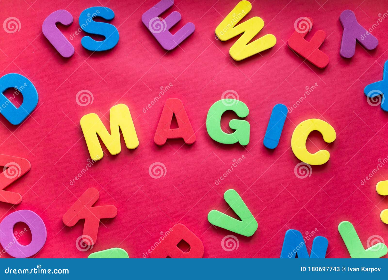 Word MAGIC from Plastic Magnetic Letters on Red Background Stock Image ...