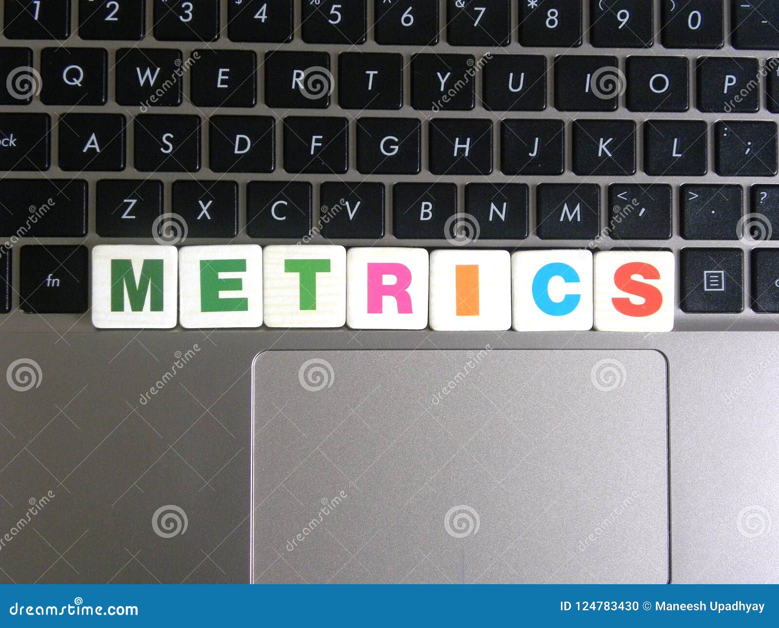 Metrics Of The Word On Paper. Concept. Words Of Metrics On A Wooden ...