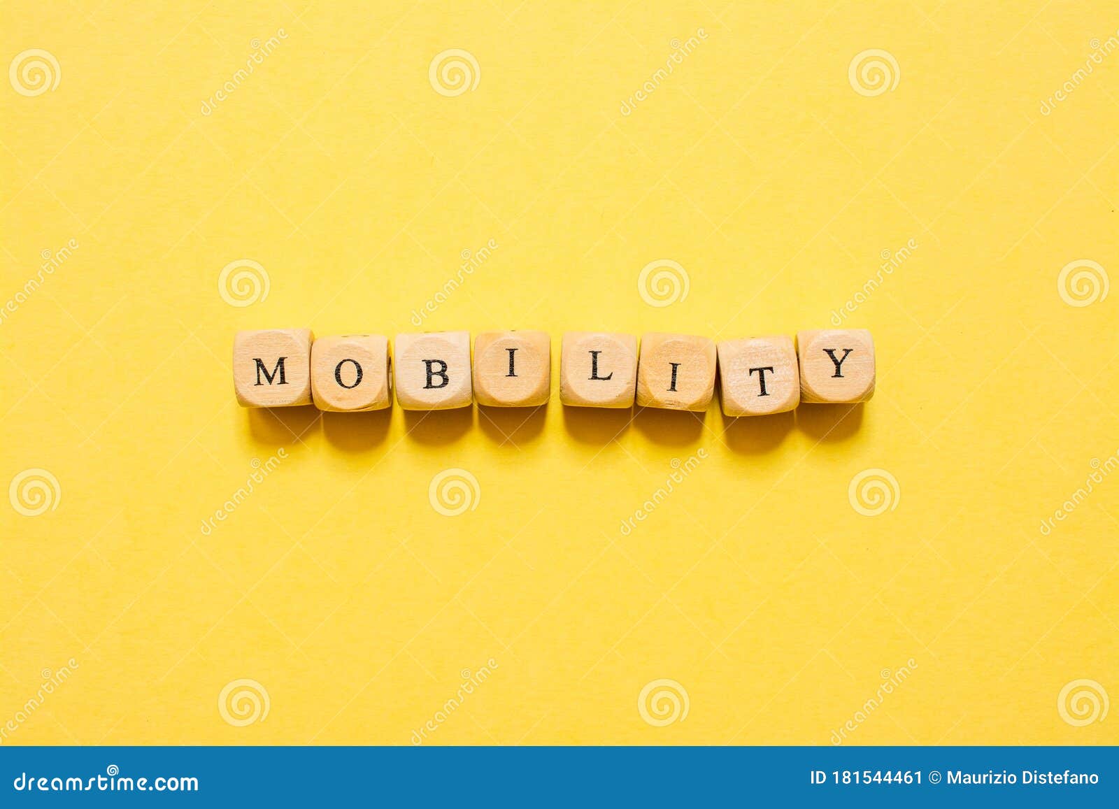 The Word Mobility, Text Made with Dice on Yellow Background Stock Image ...
