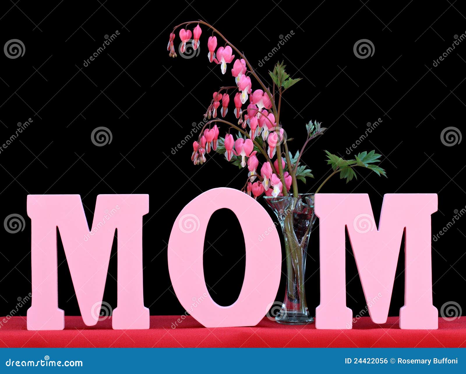 The word MOM on black stock photo. Image of dicentra - 24422056