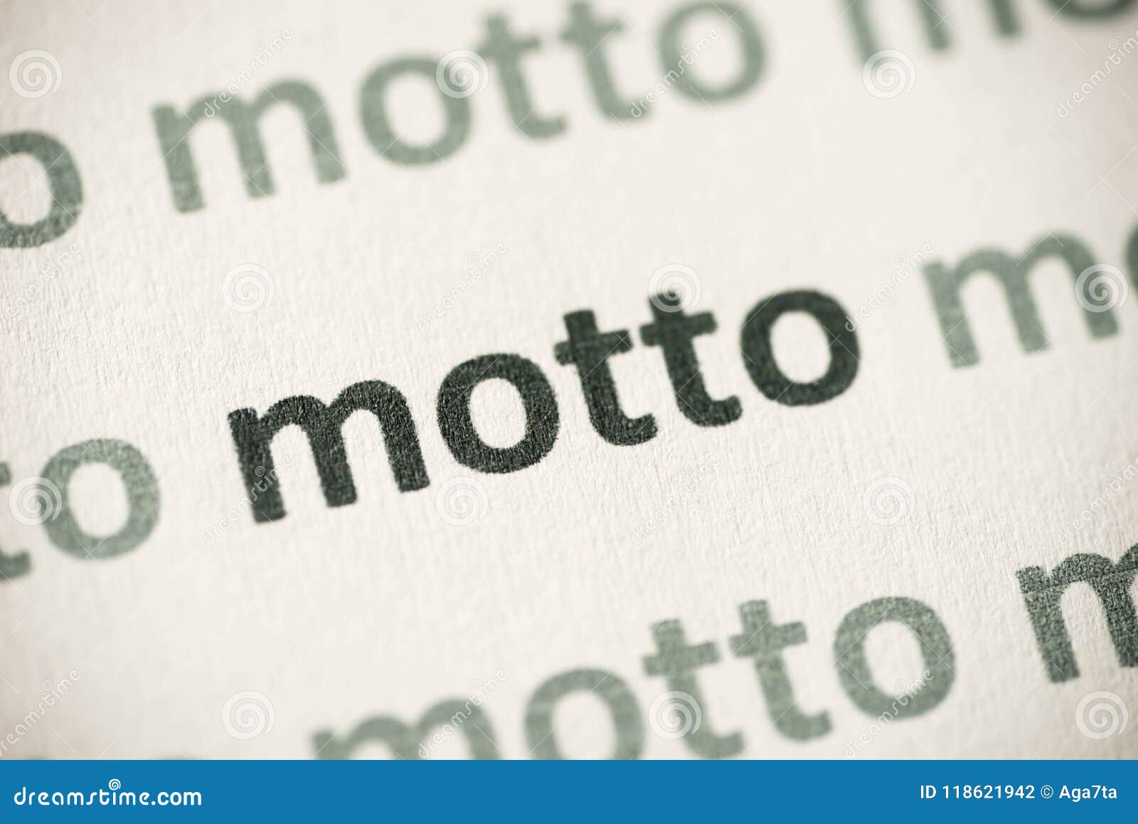 Word Motto Printed on Paper Macro Stock Photo - Image of knowledge ...