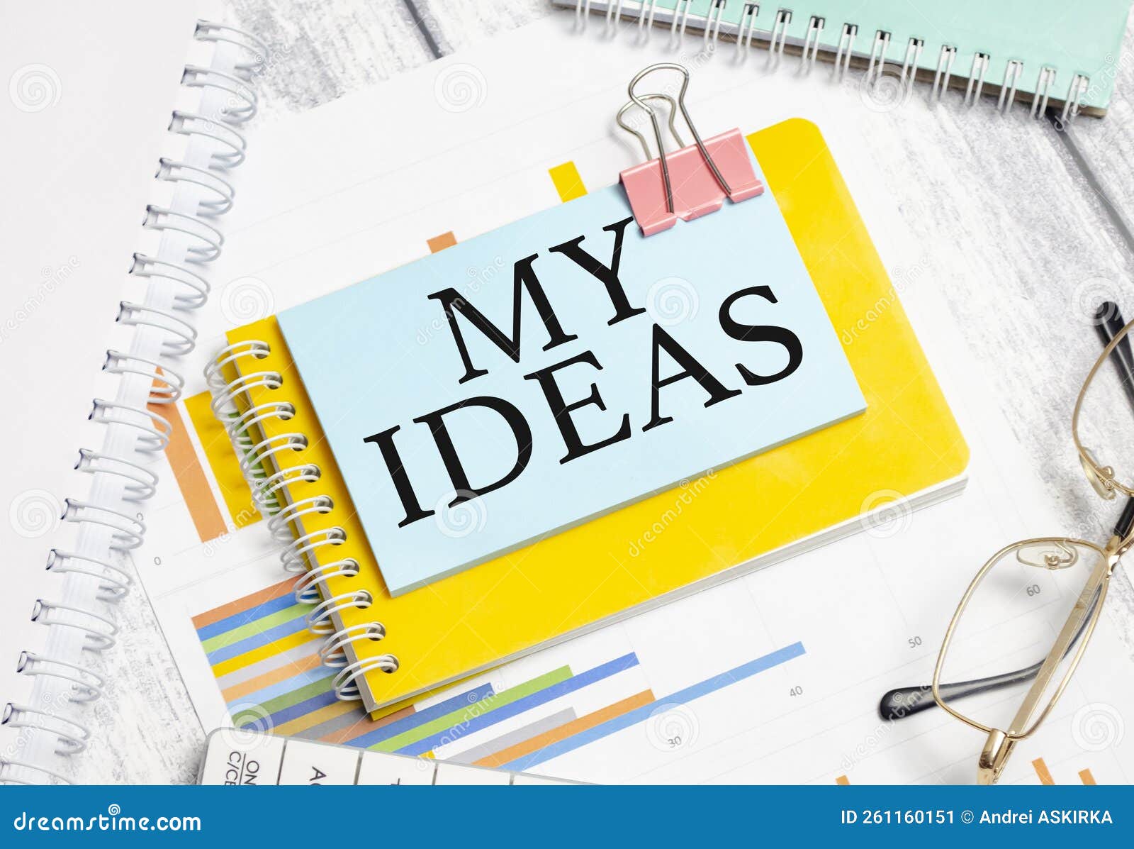 Word My Ideas on Blue Sticker with Charts and Glasses Stock Image ...