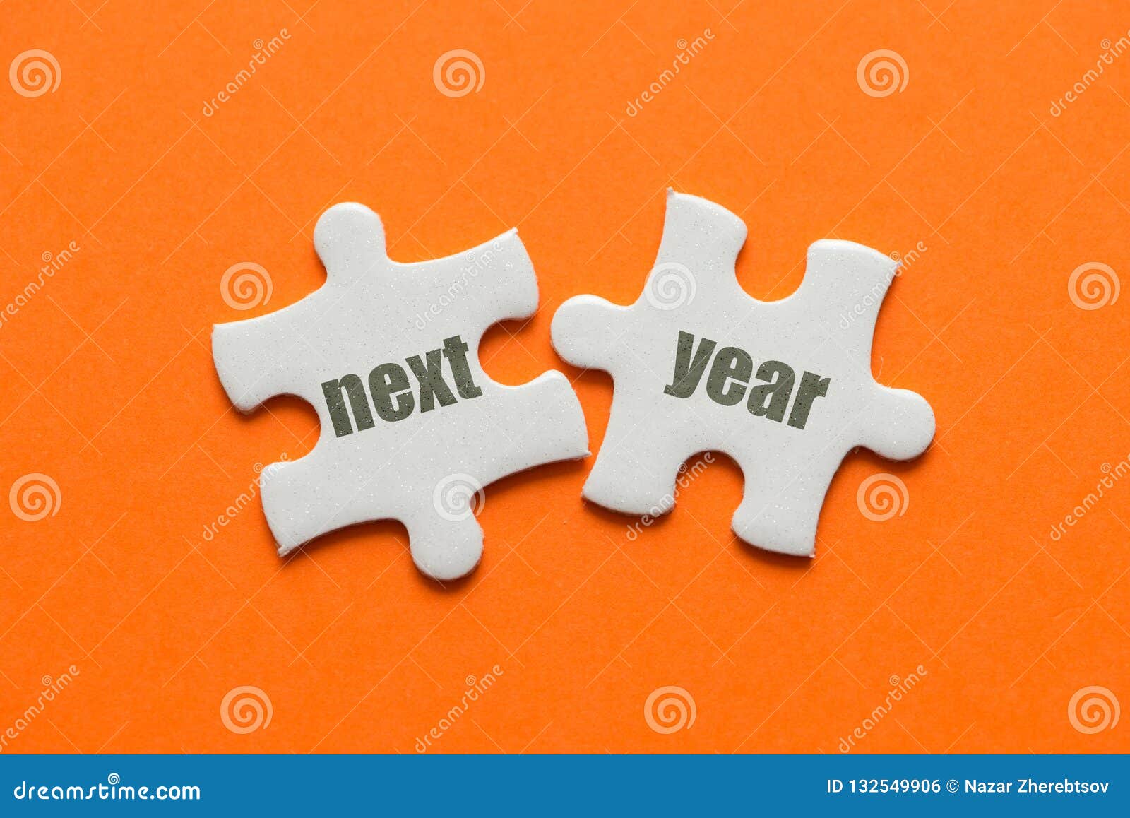 The Word Next Year on Two Matching Puzzle on Orange Background Stock ...