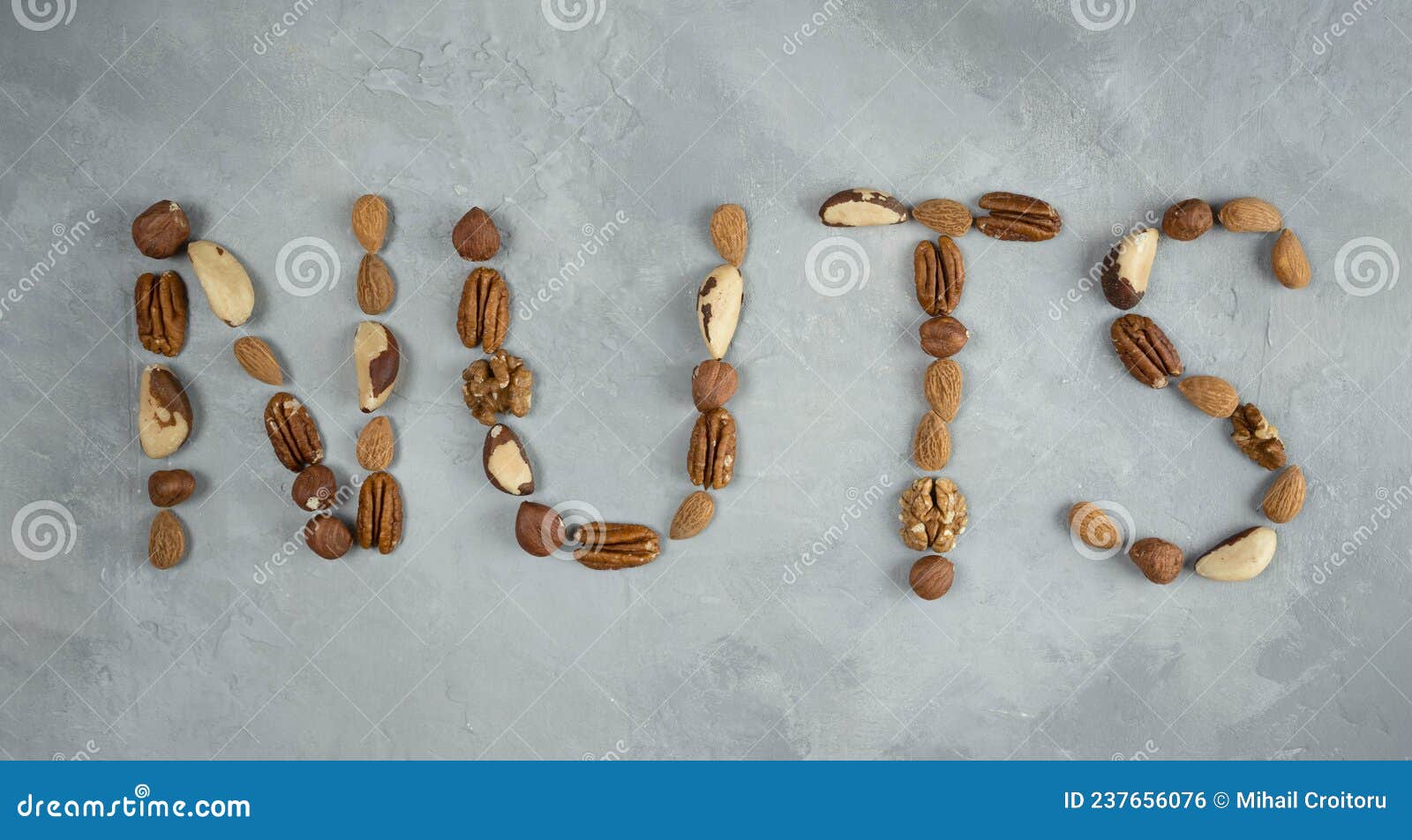 The Word Nuts from a Mixture of Nuts on a Light Gray Background Stock ...