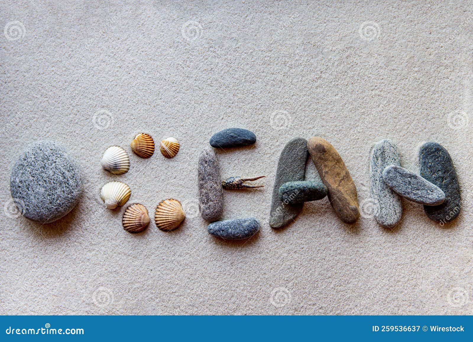 Word "ocean" Written Using Colored Stones on White Sand Stock Image ...