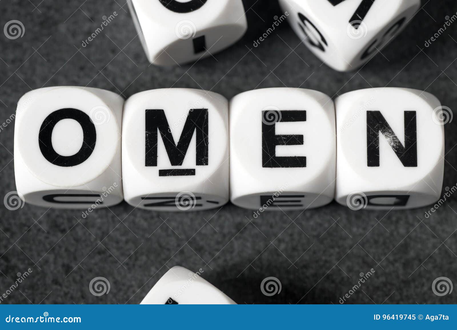 Word omen on toy cubes stock image. Image of elementary - 96419745