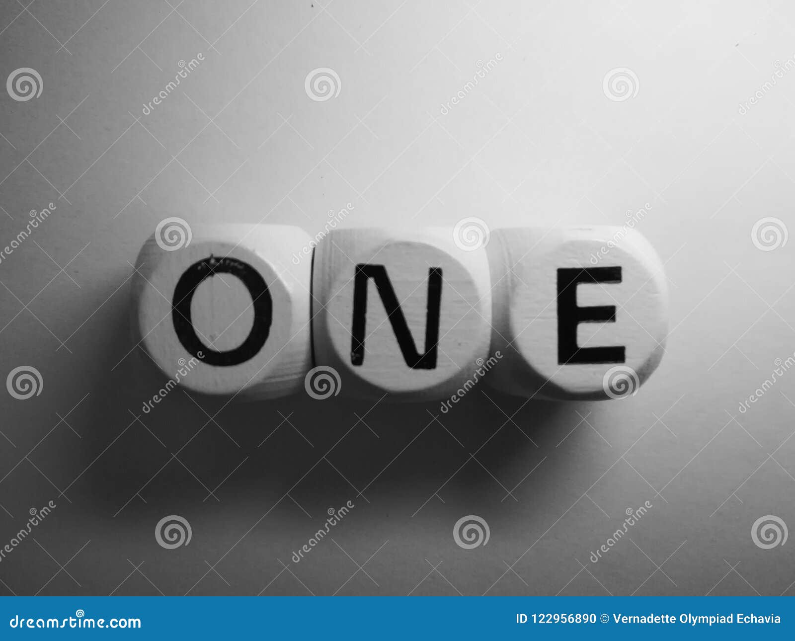 Word one on wooden dice stock photo. Image of white - 122956890