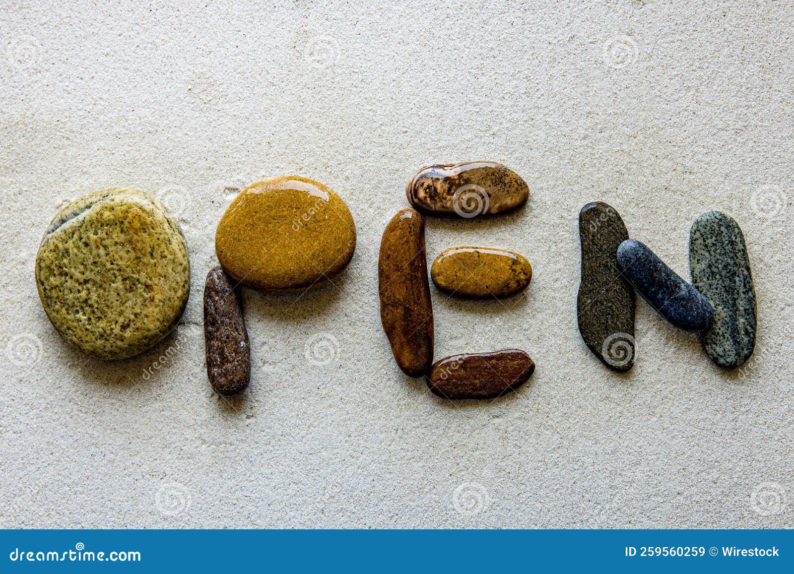 Word: OPEN, Written Using Colored Stones on White Sand Stock Image ...