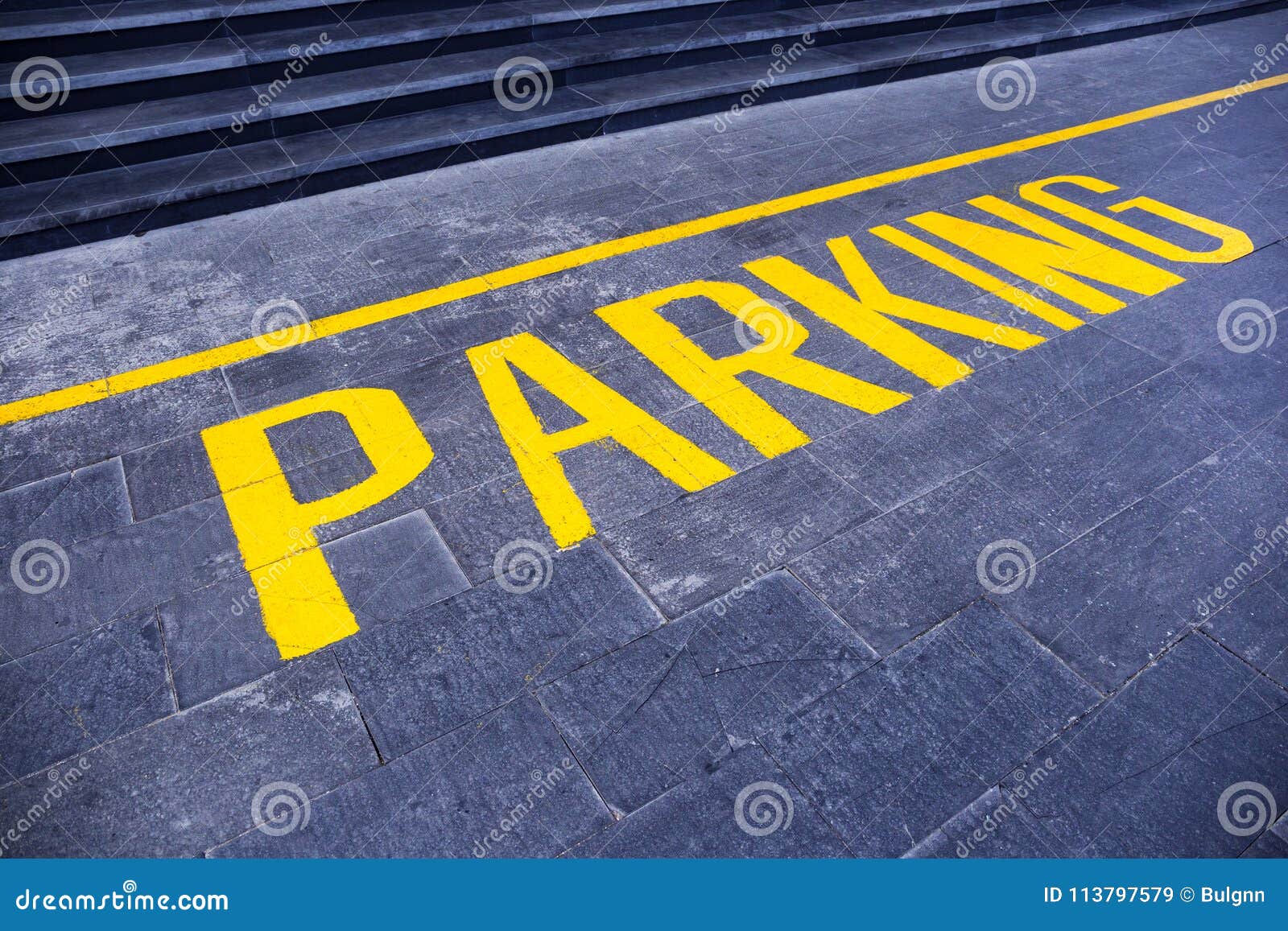 The Word `parking` Painted in Yellow Stock Image - Image of sign ...