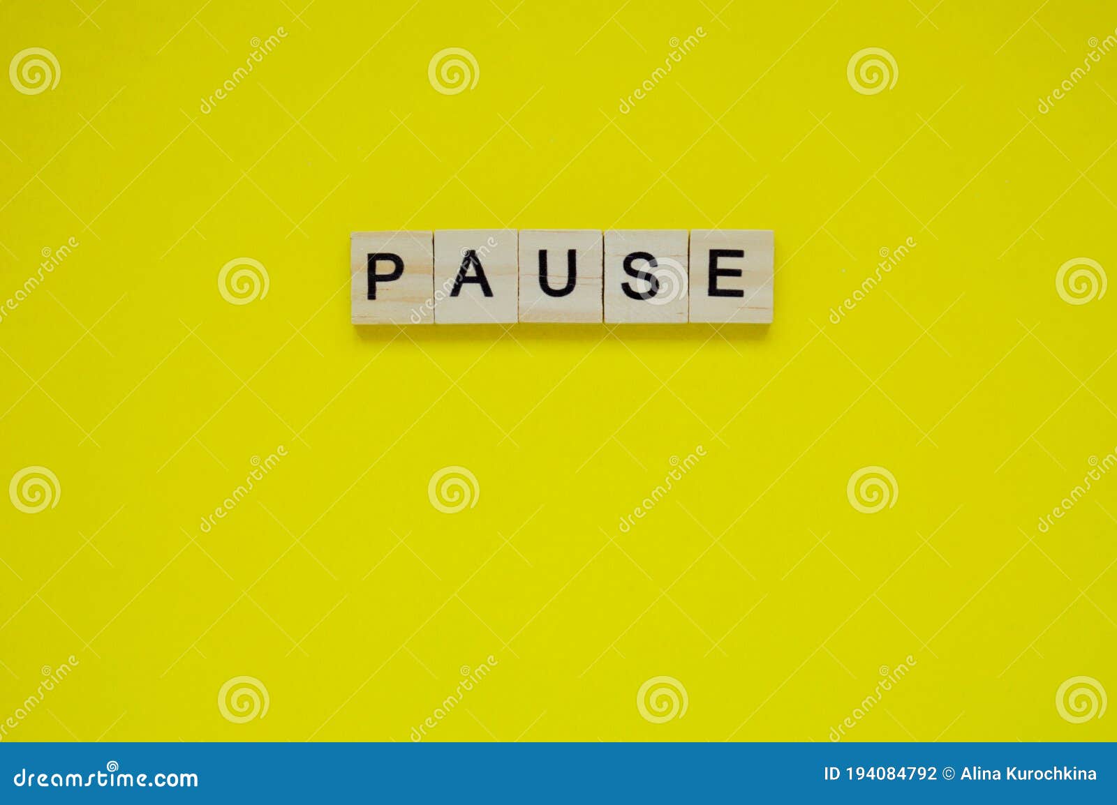 Word Pause. Top View of Wooden Blocks with Letters on Yellow Surface ...
