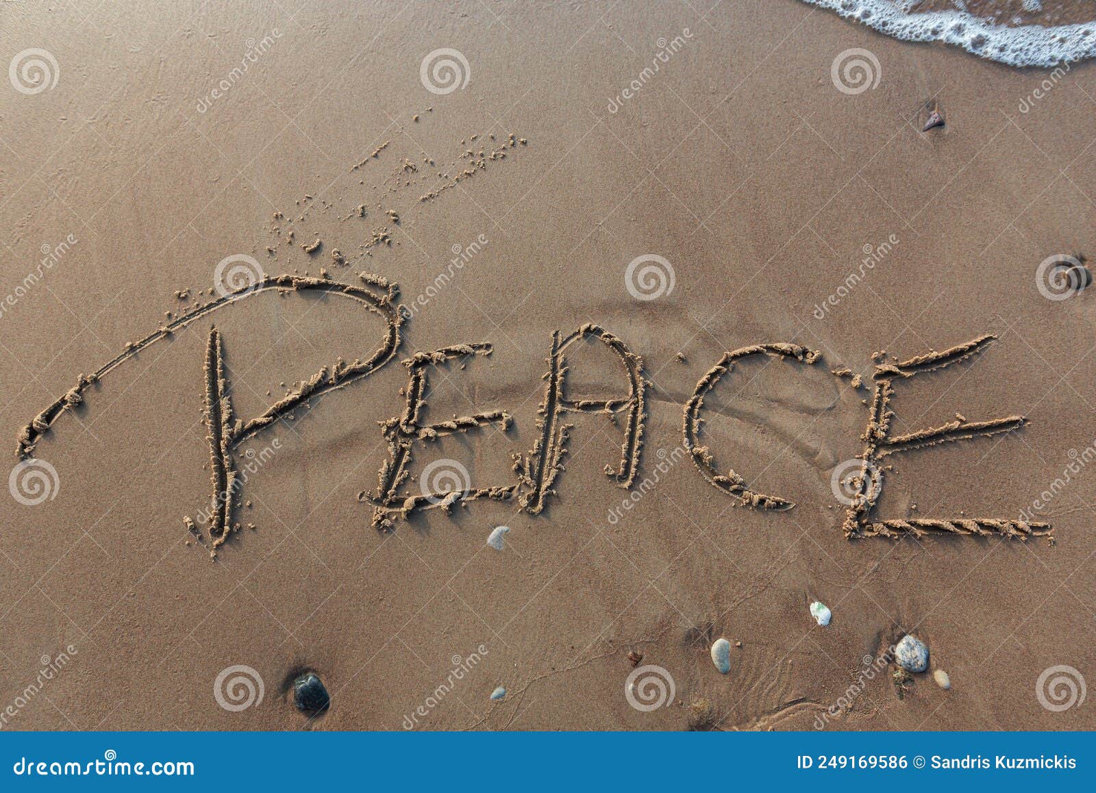 The Word `Peace` on the Sea Sand, Written with Stick on the Beach ...