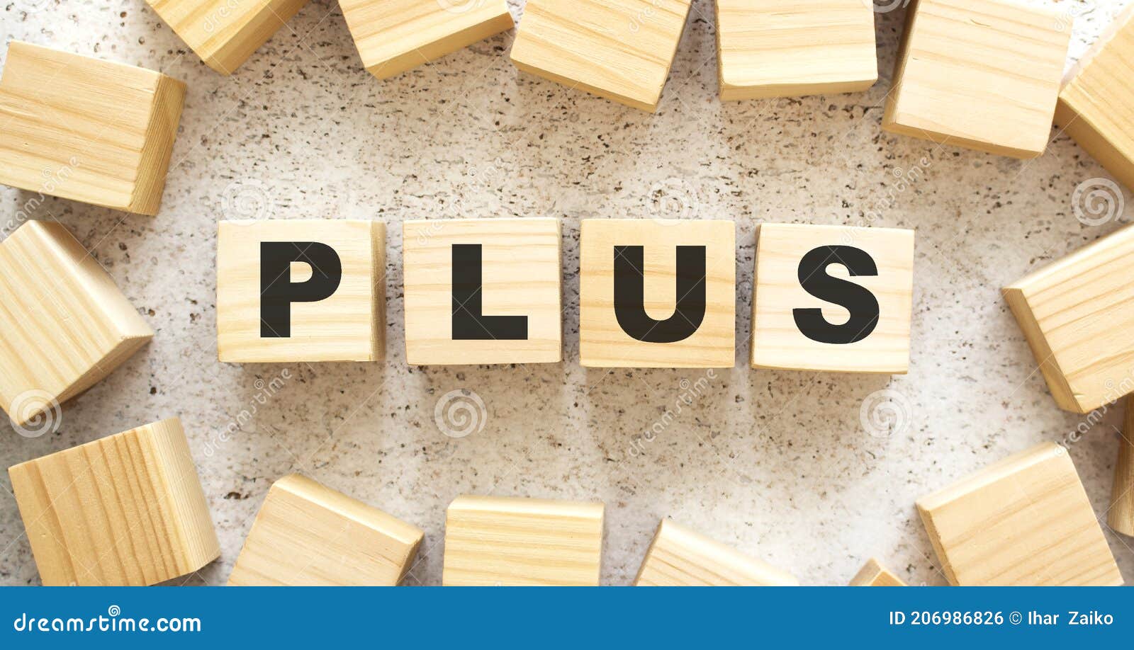 The Word PLUS Consists of Wooden Cubes with Letters, Top View on a ...