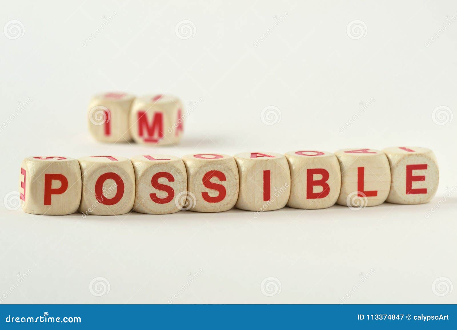The Word Possible Written with Wood Blocks - Changing Impossible Stock ...