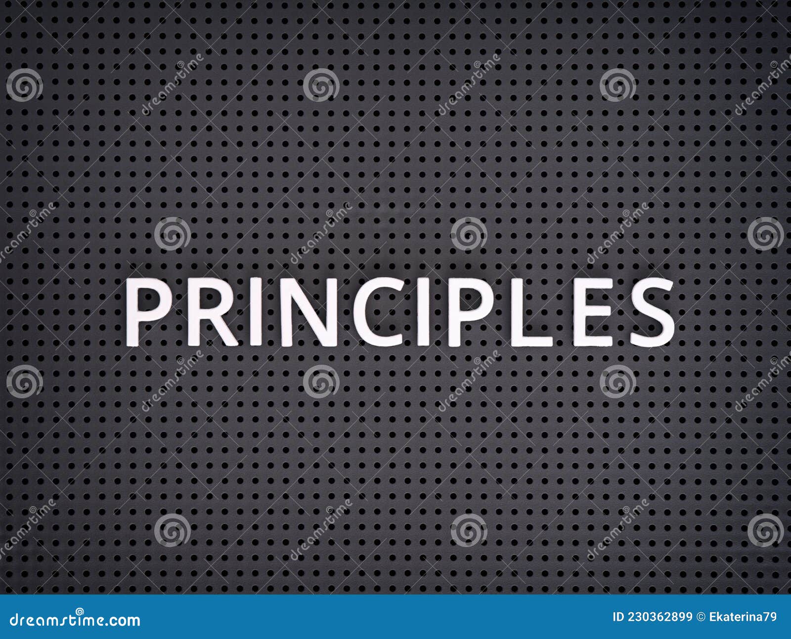 Word Principles Spelled Out with White Letters on Gray Pegboard Stock ...