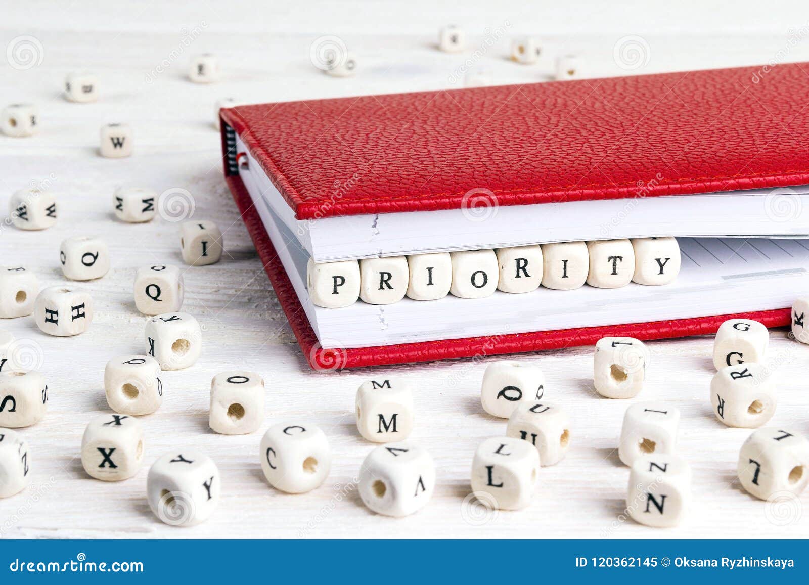 Word Priority Written in Wooden Blocks in Red Notebook on White Stock ...