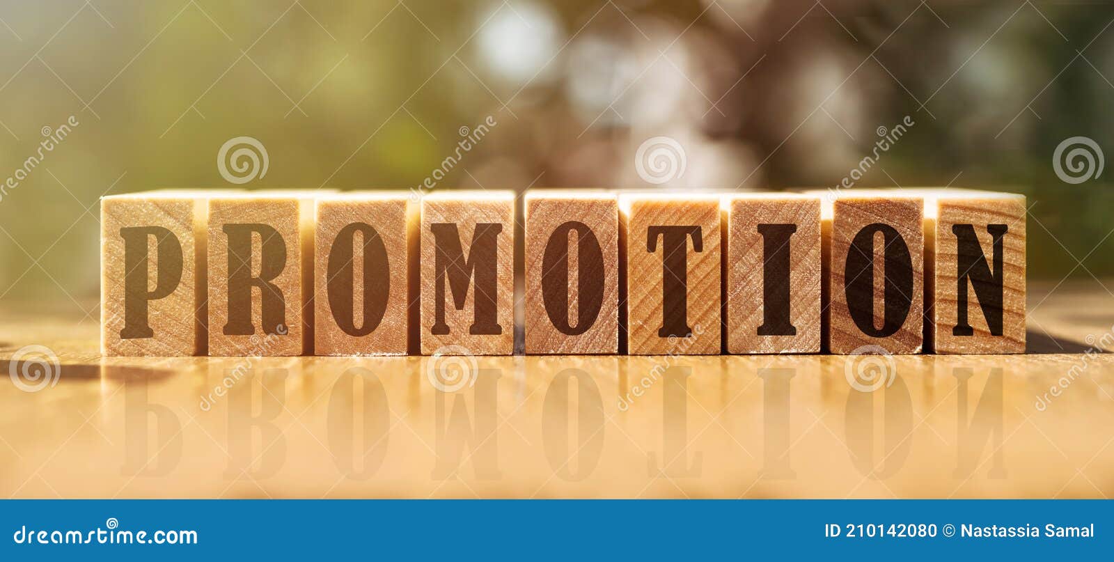 Word PROMOTION Made with Building Wooden Blocks on Table in Sunlight ...