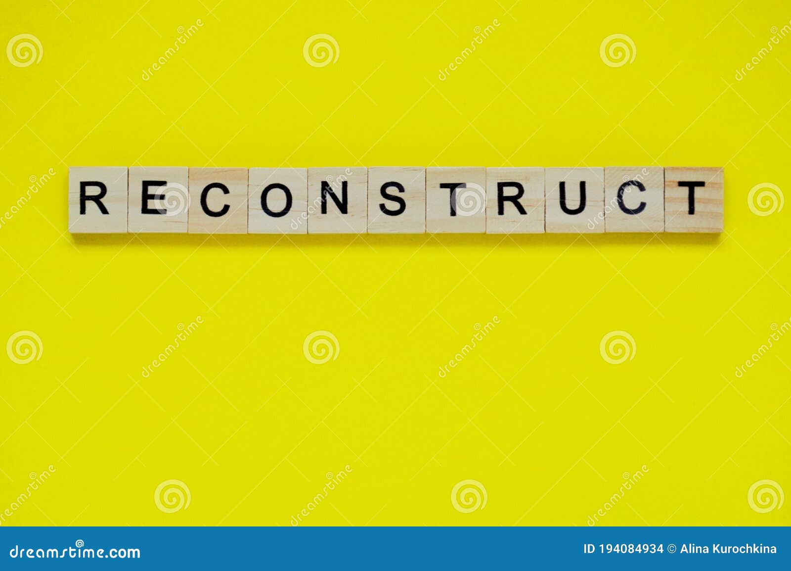 Word Reconstruct. Top View of Wooden Blocks with Letters on Yellow ...
