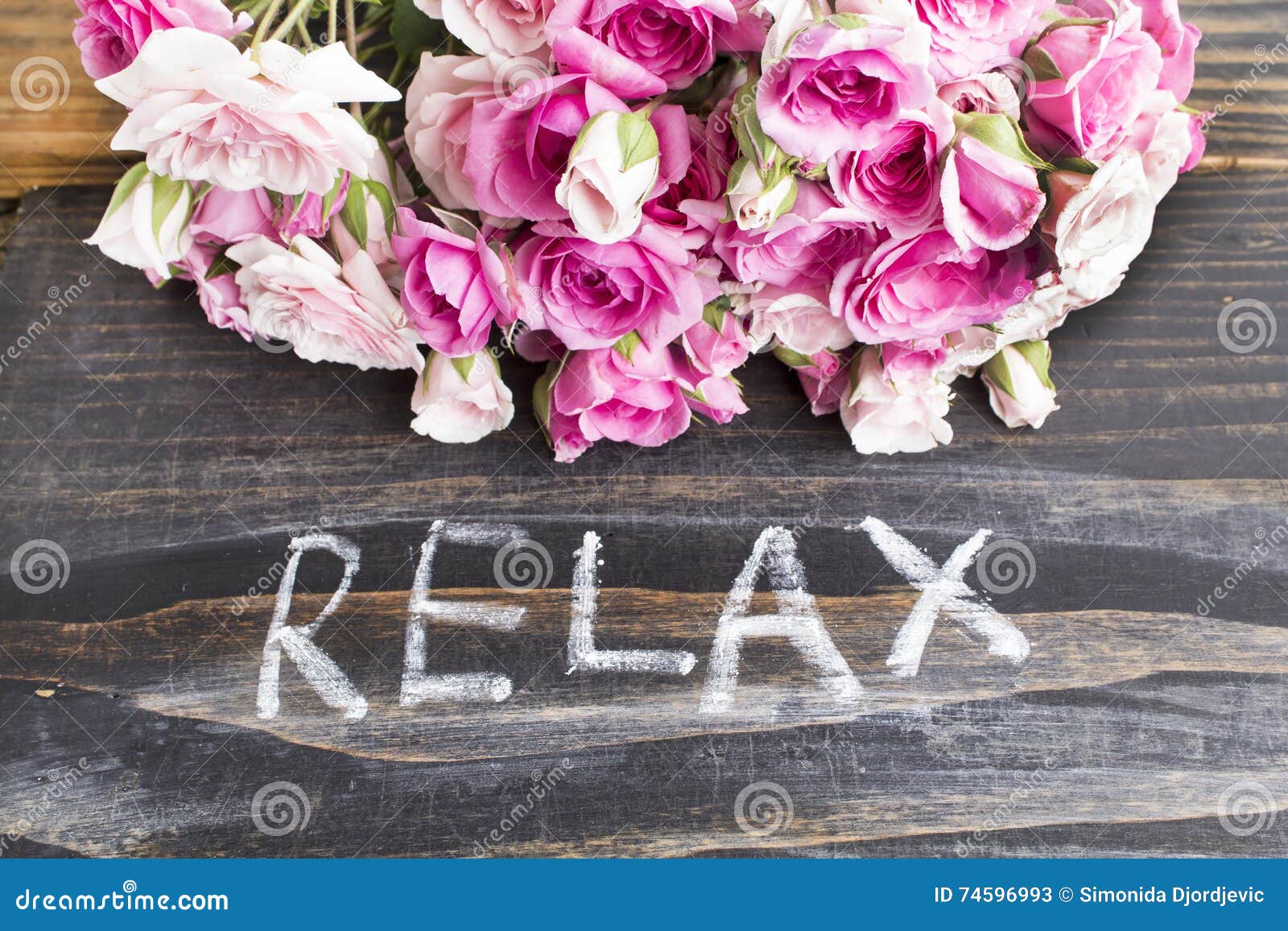 Word Relax with Pink Roses on a Rustic Wooden Background Stock Image ...