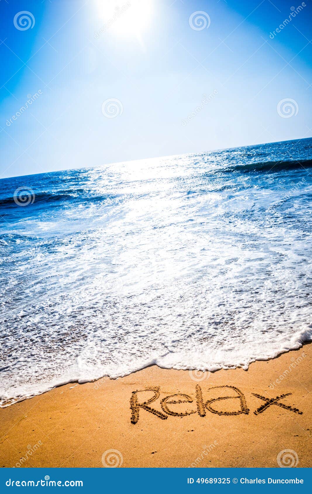 The Word RELAX Written into the Sand on a Beach Stock Image - Image of ...