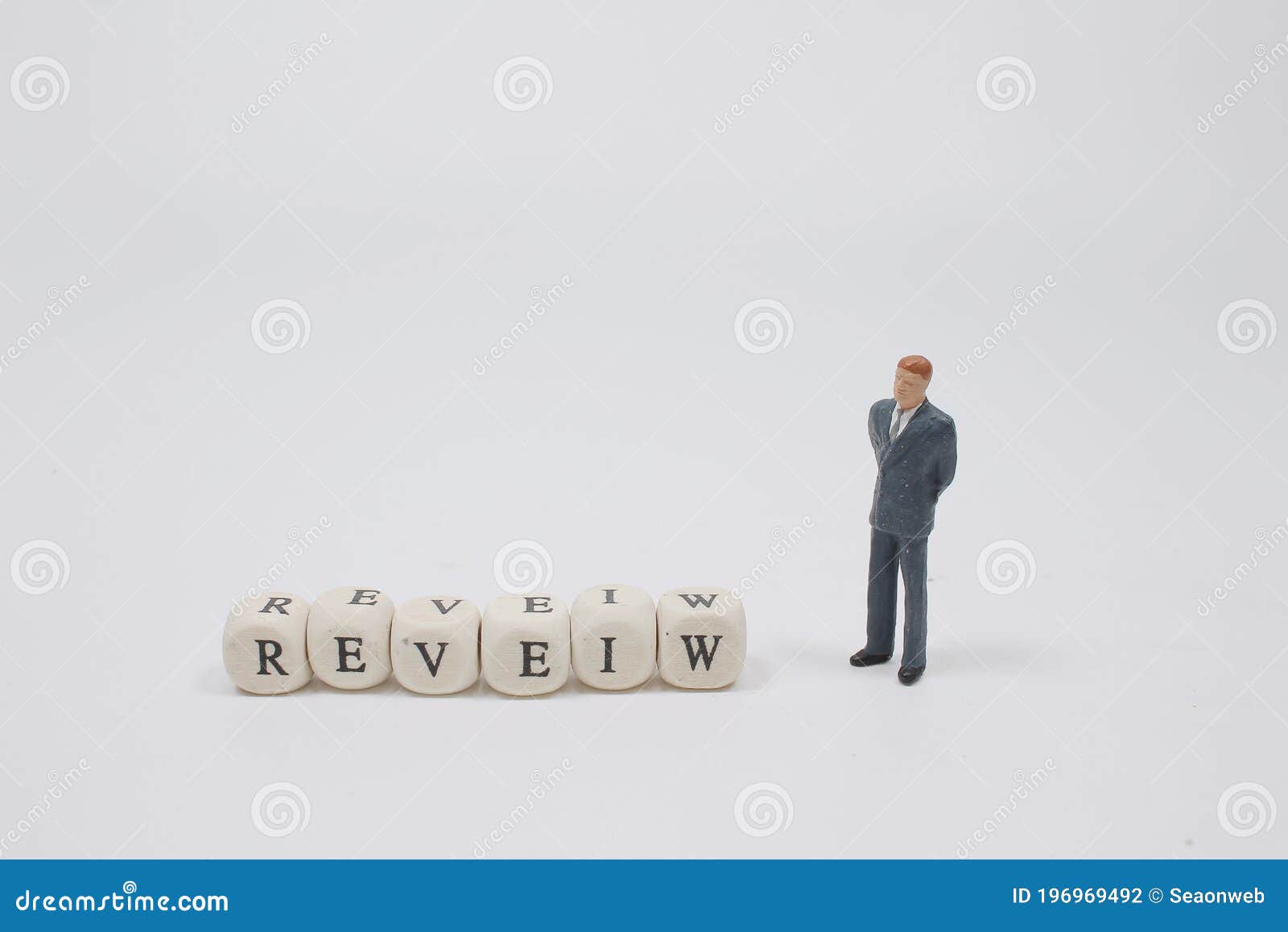 A Word REVIEW on Wooden Cube Block with Figure Stock Photo - Image of ...