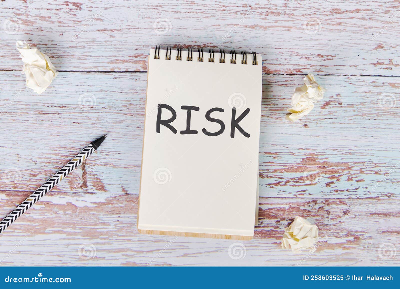 The Word Risk is Written on a Notebook. the Concept of an Unpredictable ...