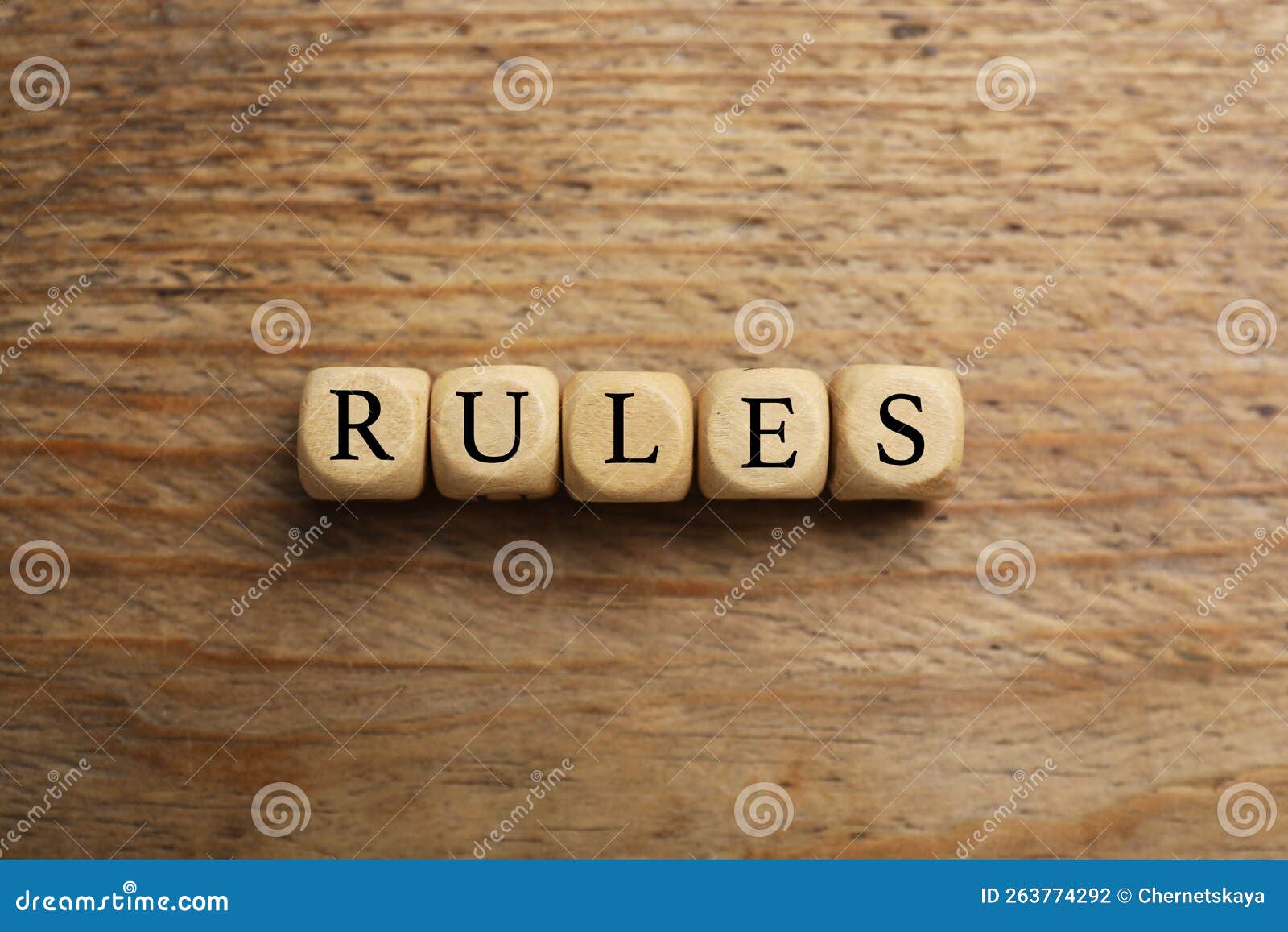 Word Rules Made of Cubes with Letters on Wooden Table, Top View Stock ...