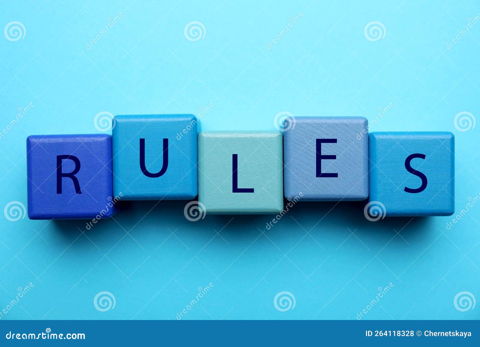 Word Rules Made of Wooden Cubes with Letters on Light Blue Background ...