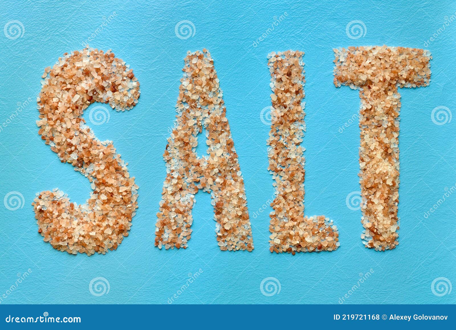 Word Salt is Made of Coarse Himalayan Pink Salt on Blue Background ...
