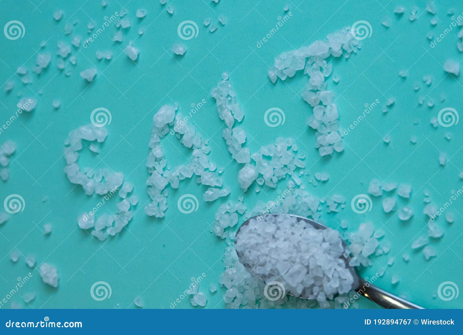 Word Salt Written with Sea Salt on a Blue Surface Stock Image - Image ...