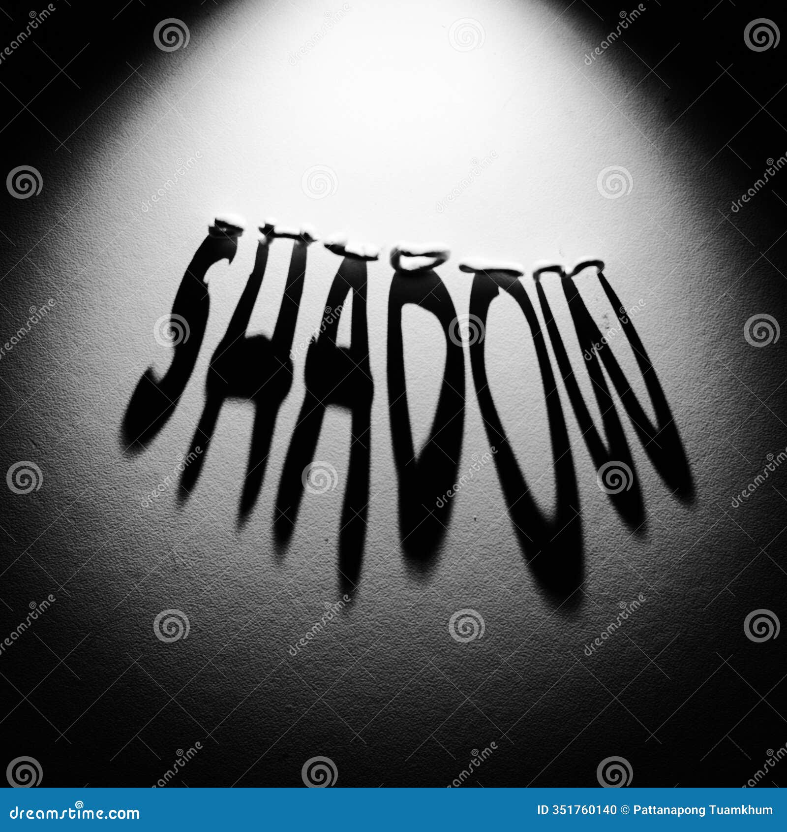 The Word SHADOW is Cast As a Shadow on a Textured, Light Gray Surface ...