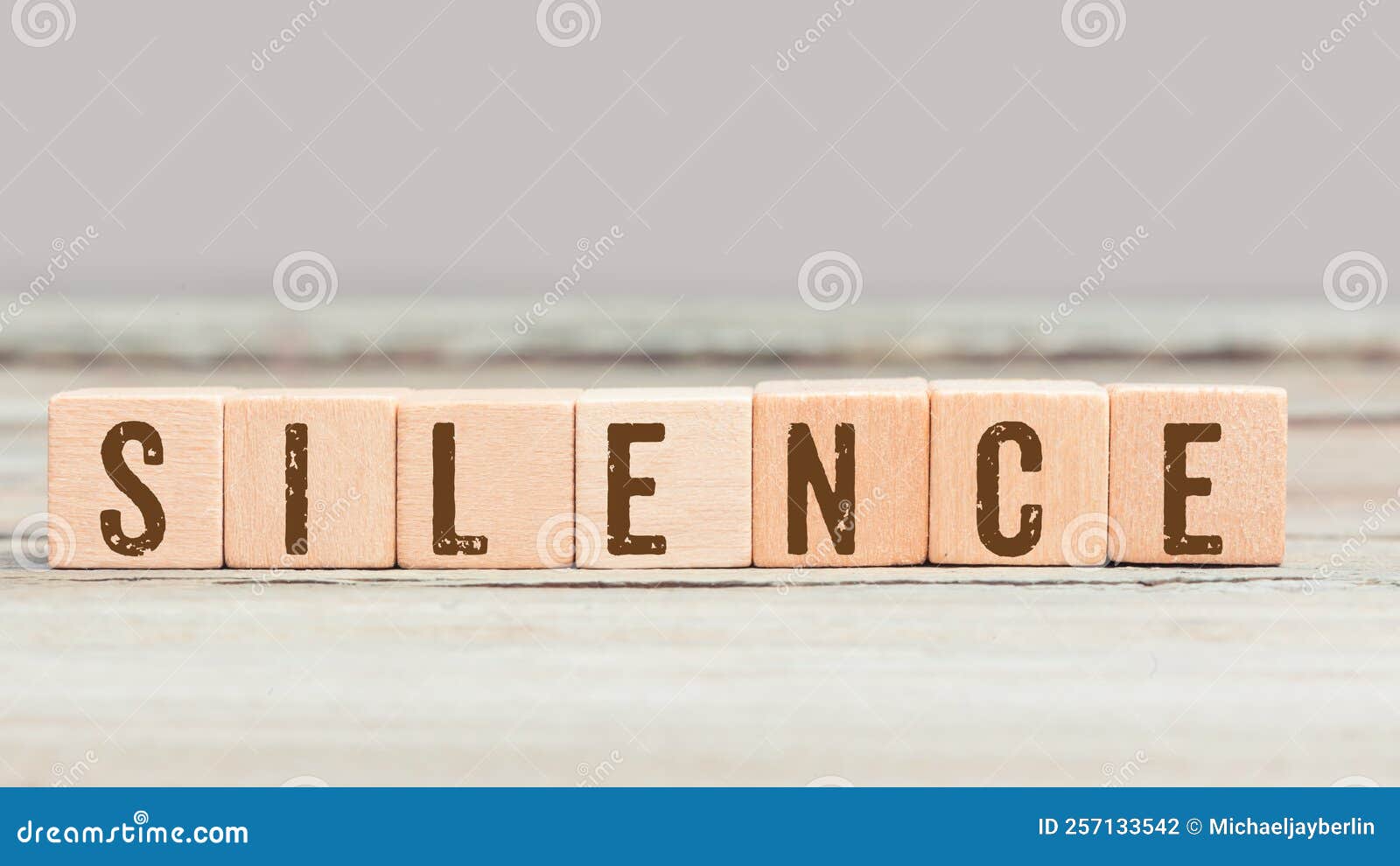 Word Silence on wood cubes stock photo. Image of table - 257133542
