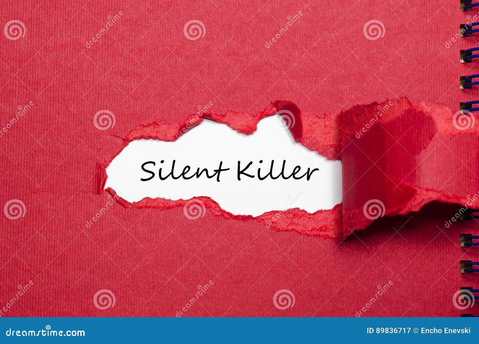 The Word Silent Killer Appearing Behind Torn Paper Stock Image - Image ...