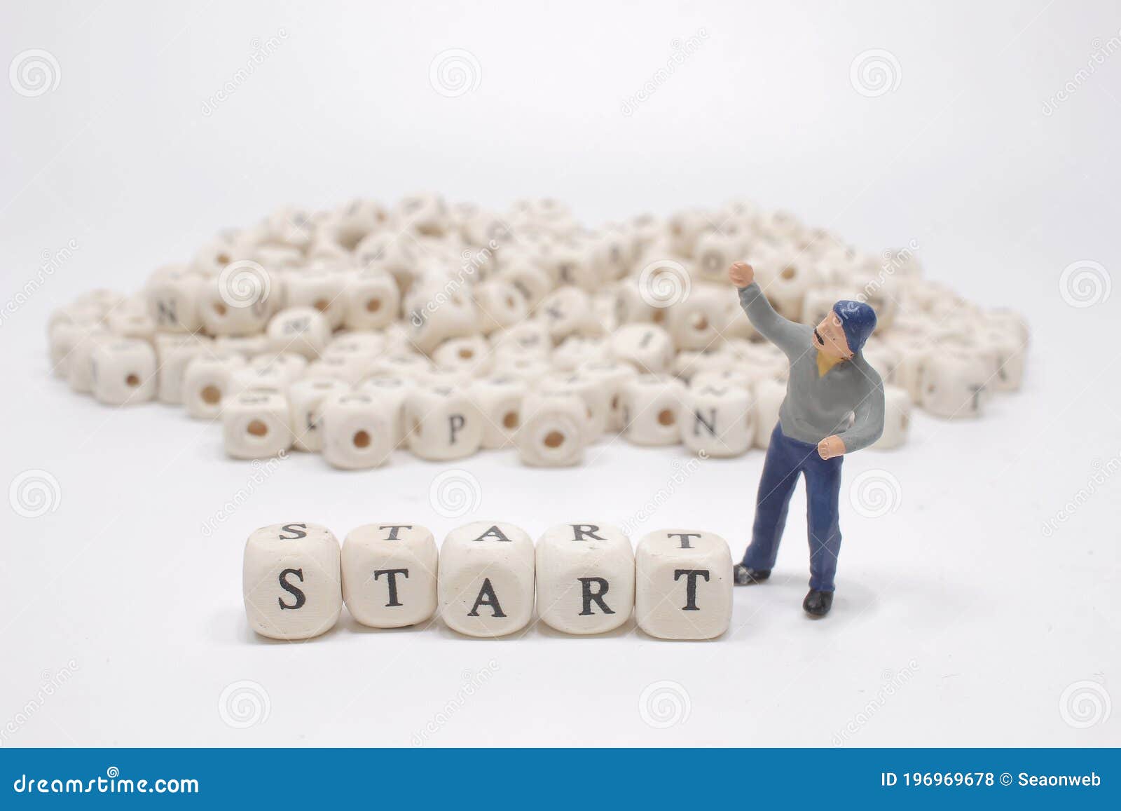 A Word Start on Wooden Cube Block with Figure Stock Photo - Image of ...