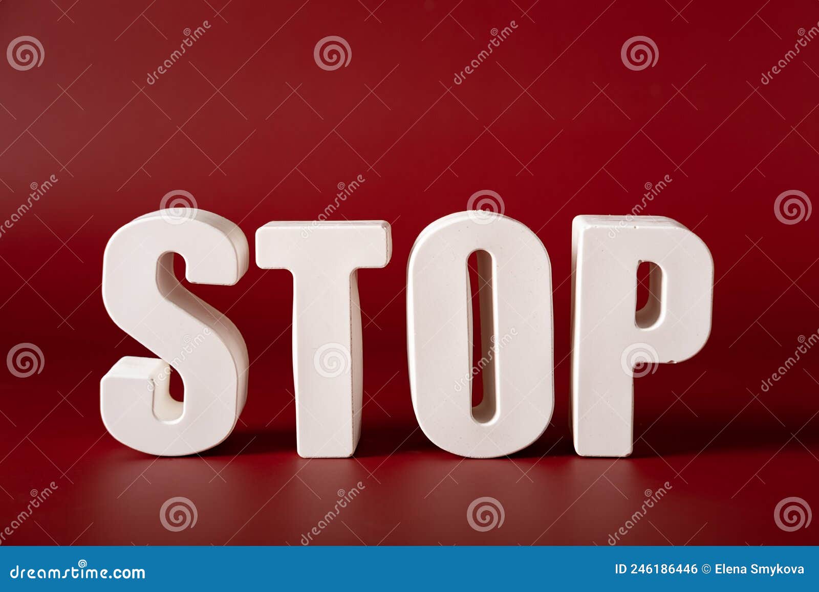 Word Stop Made from White Concrete Letters on the Red Background Stock ...