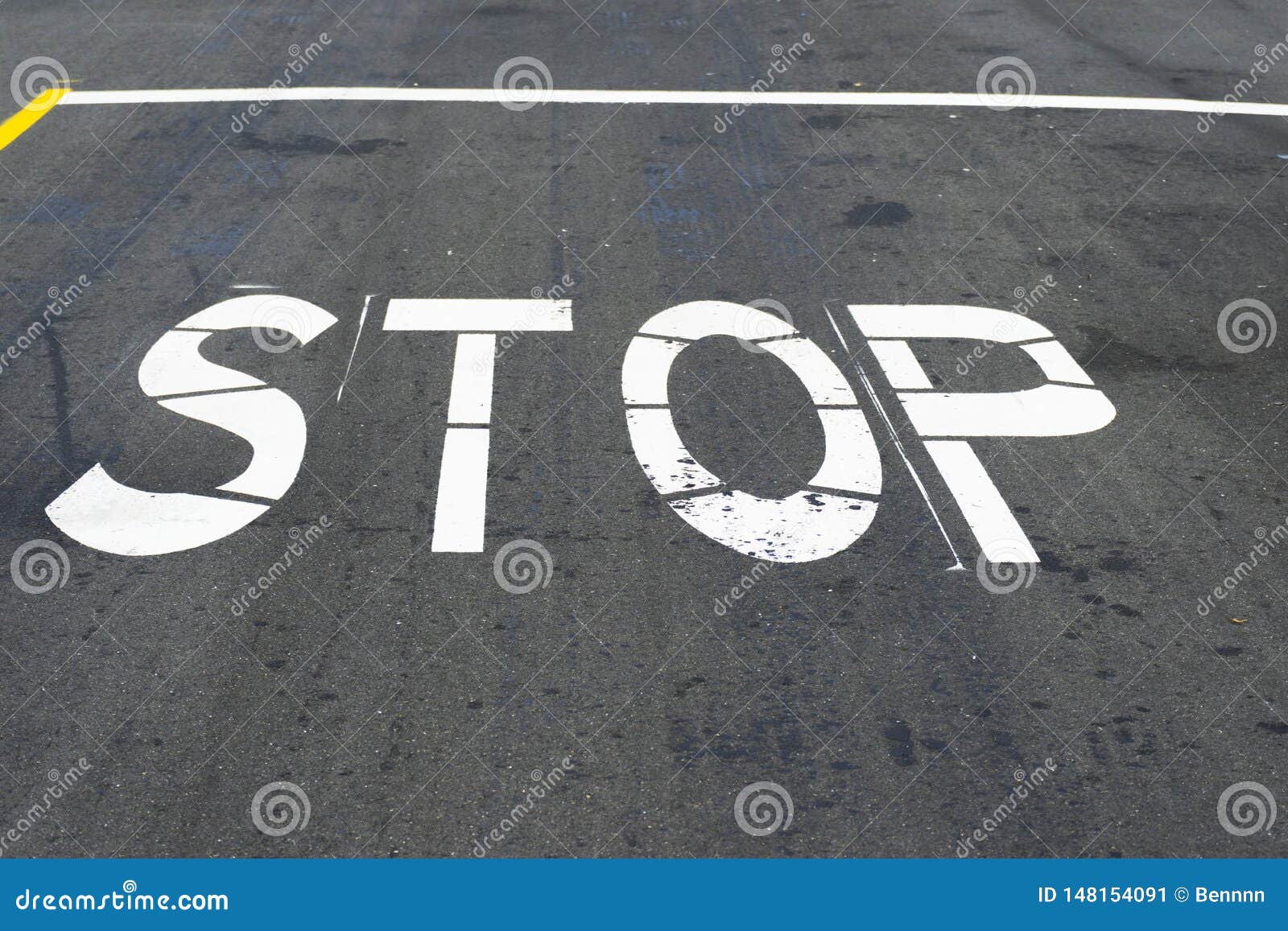 Word `stop` on the road stock image. Image of ground - 148154091