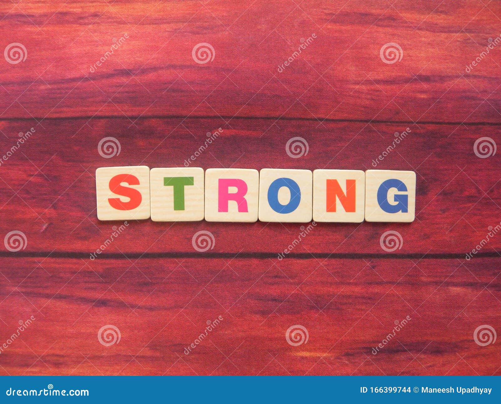 The Word Strong Painted In Black Paint On Wooden Sign American Flags In ...