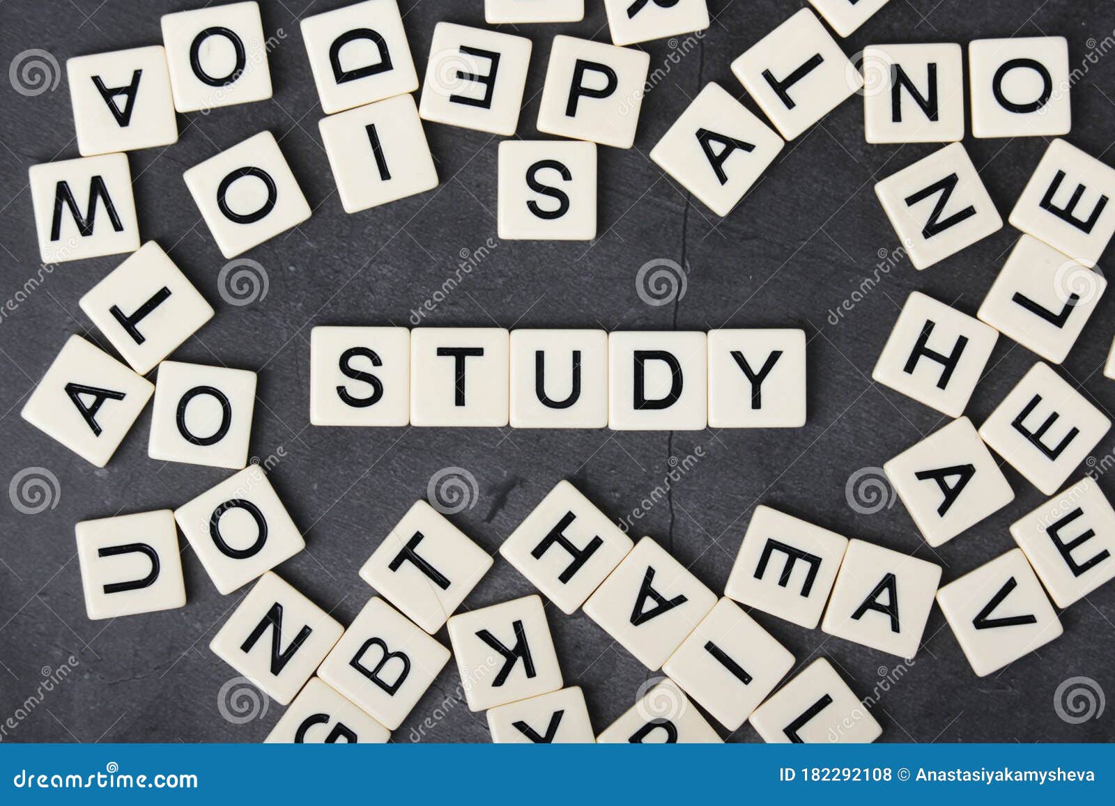 A Word Study Formed with Plastic Letter Tiles Stock Photo - Image of ...