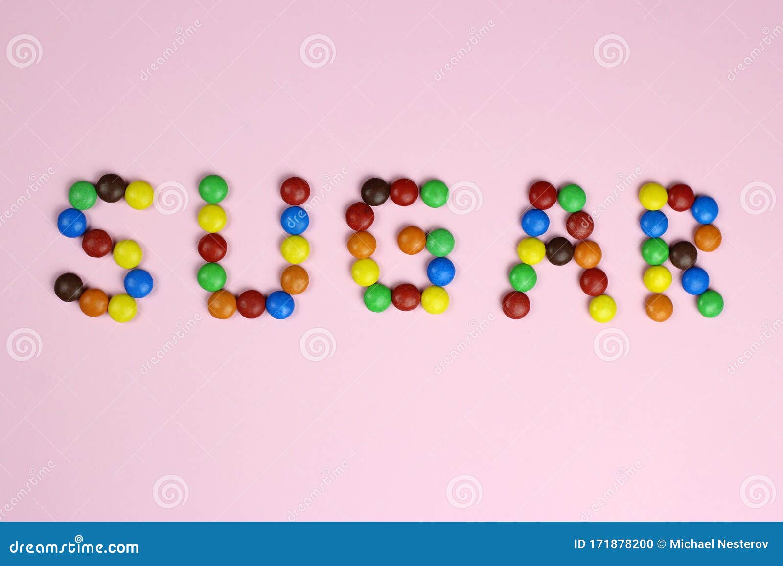 The Word Sugar from Colored Candies on a Pink Background Stock Photo ...