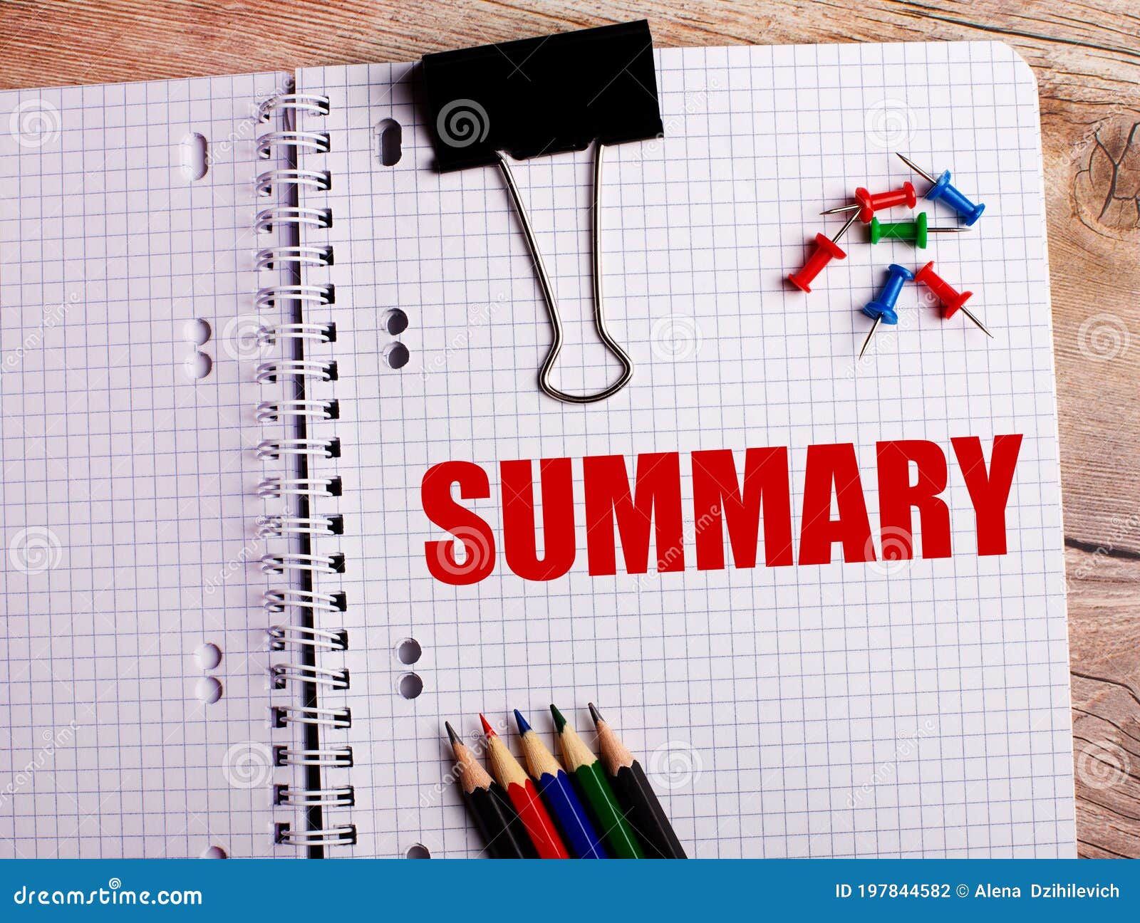 The Word SUMMARY is Written in a White Notebook Near Colored Pencils ...