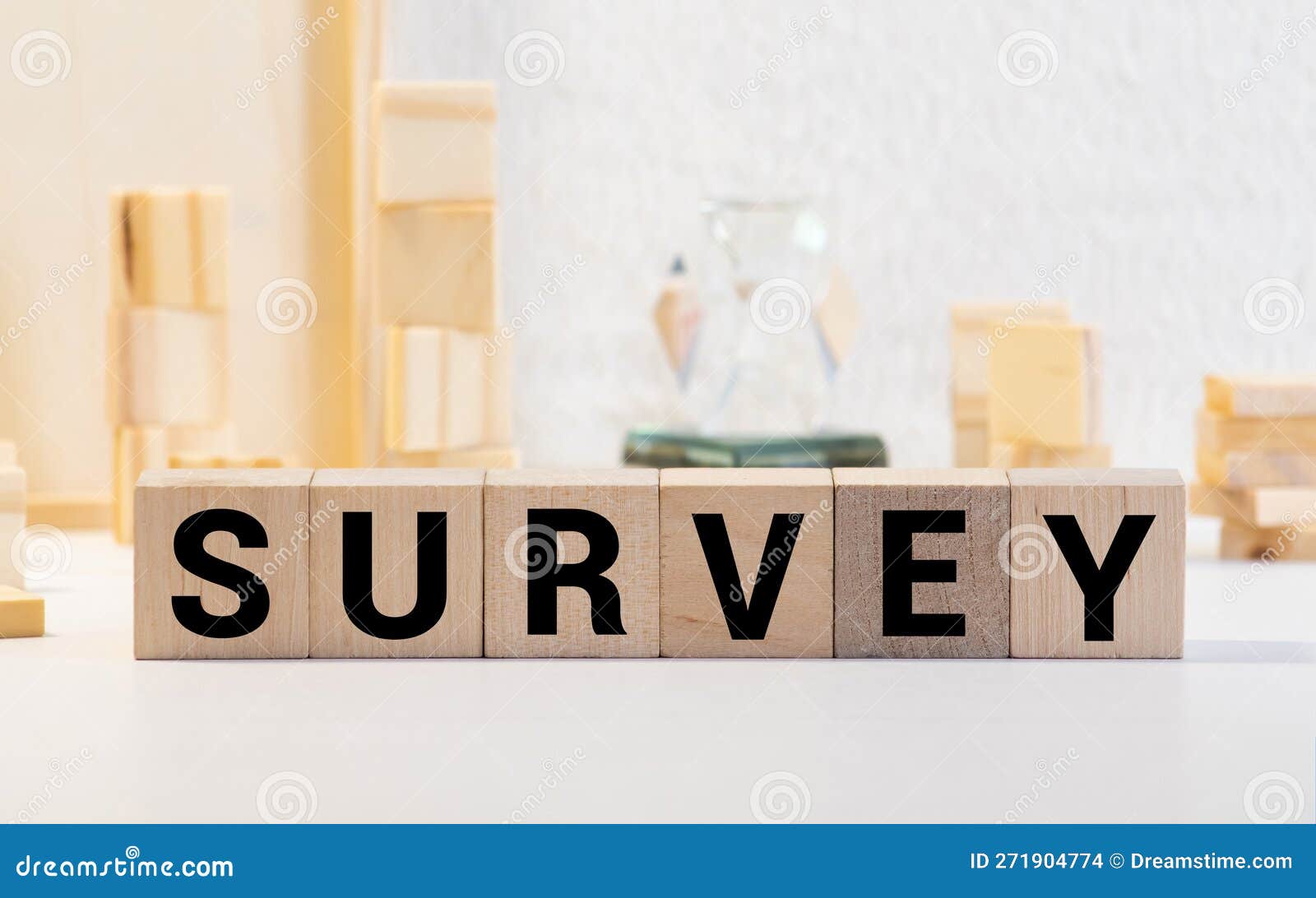 A Word Survey and Wooden Letters Around Stock Photo - Image of cube ...