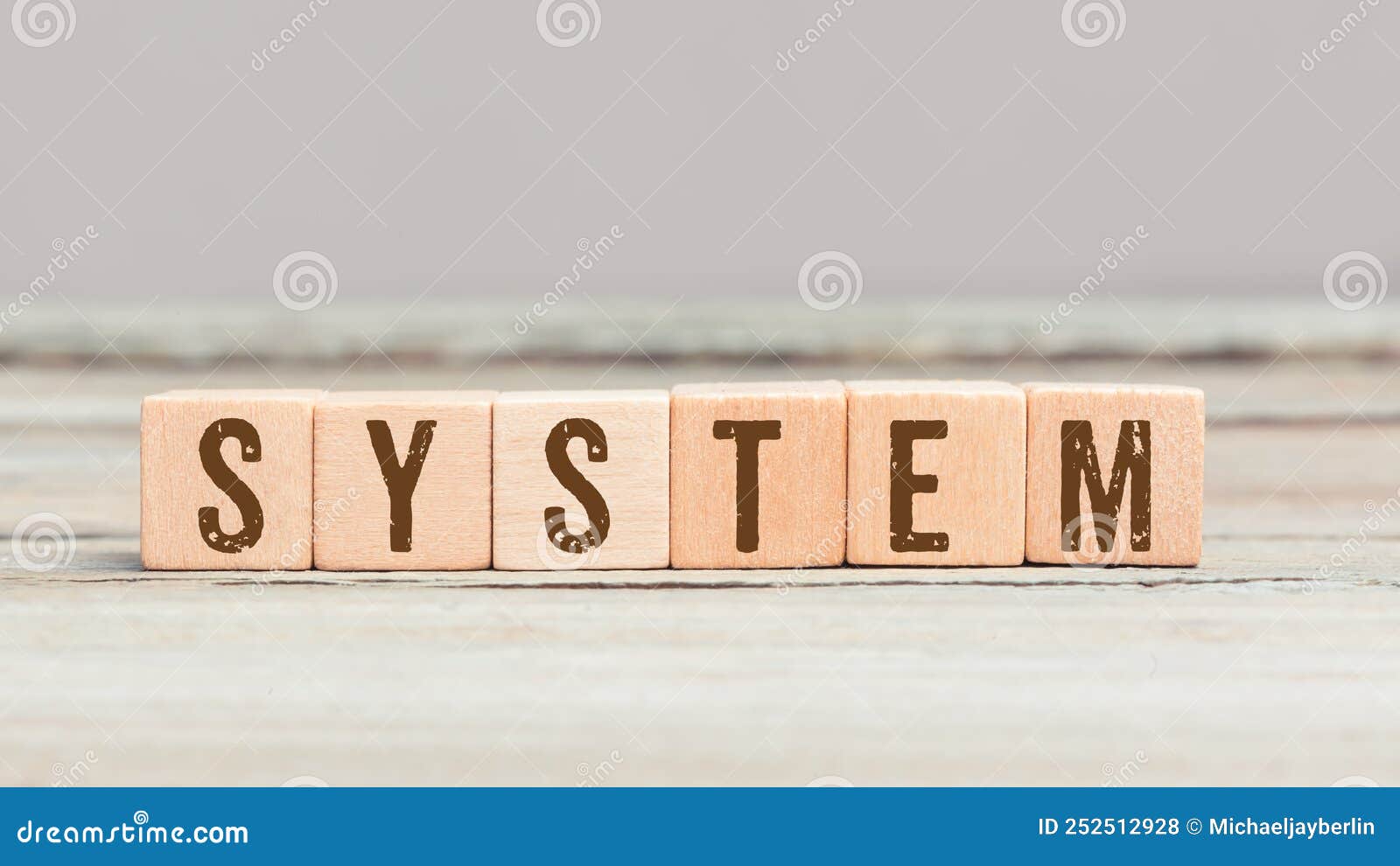Word System on wood cubes stock photo. Image of headline - 252512928