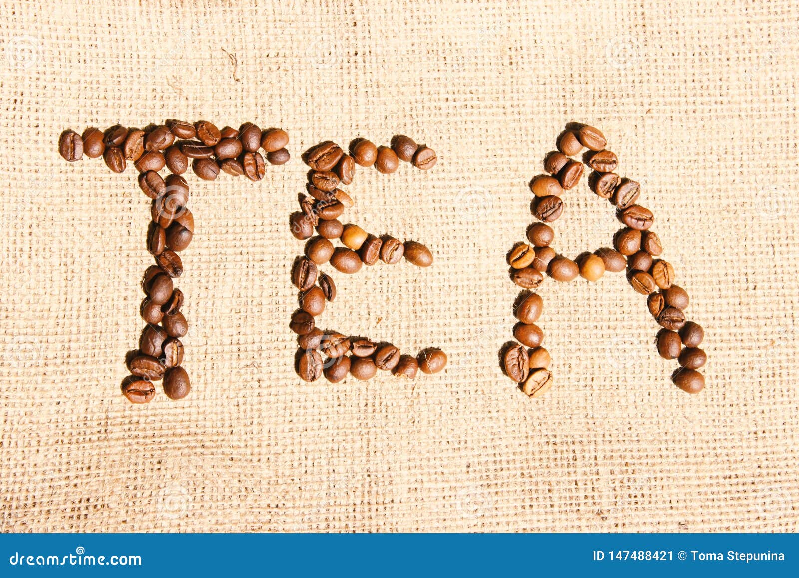 Word `Tea` Written in Coffee Beans Over Bagging Background. Coffee ...