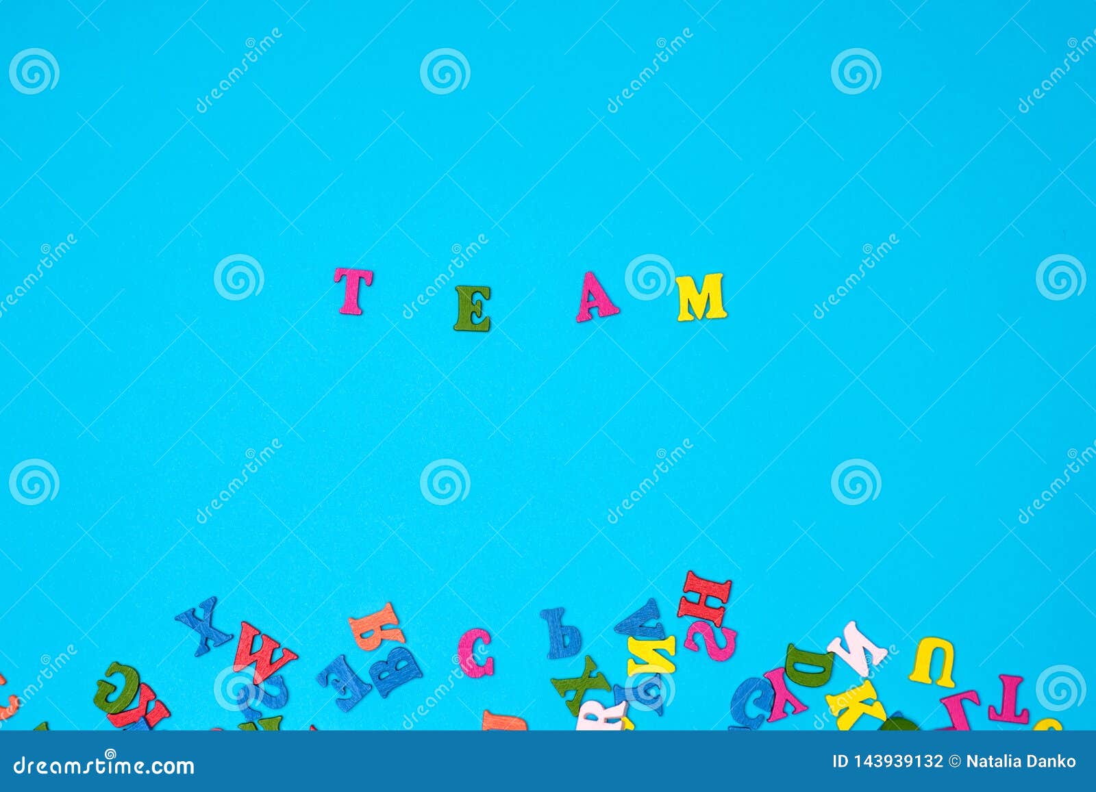 Word Team of Multi-colored Letters on a Blue Background Stock Photo ...