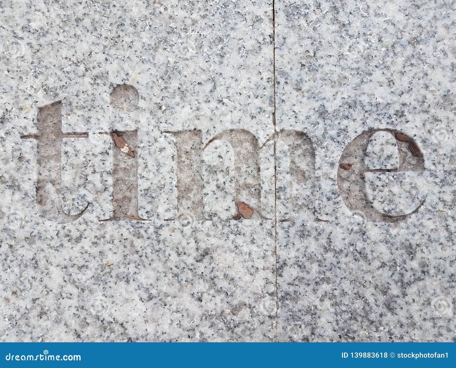 The Word Time Engraved in Black and White Marble Stock Photo - Image of ...
