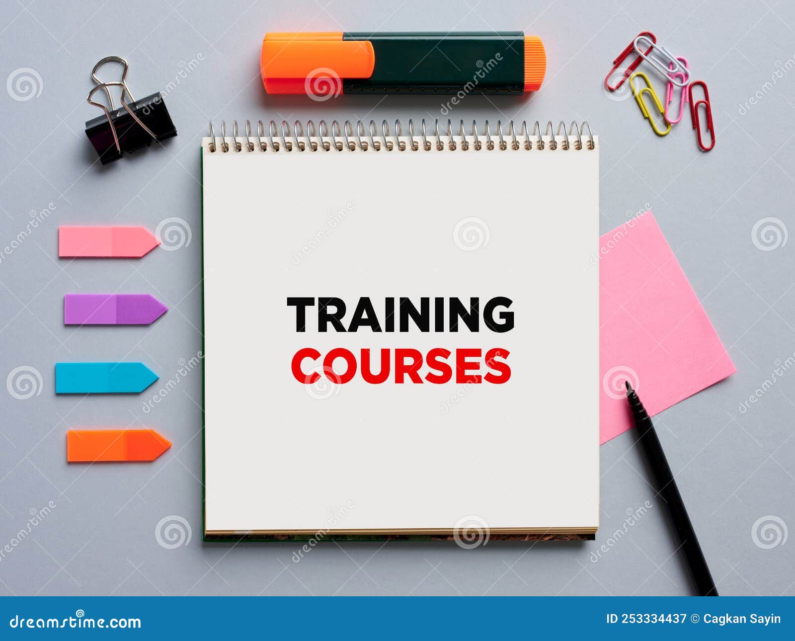 The Word Training Courses Written on a Notebook on Business Office ...